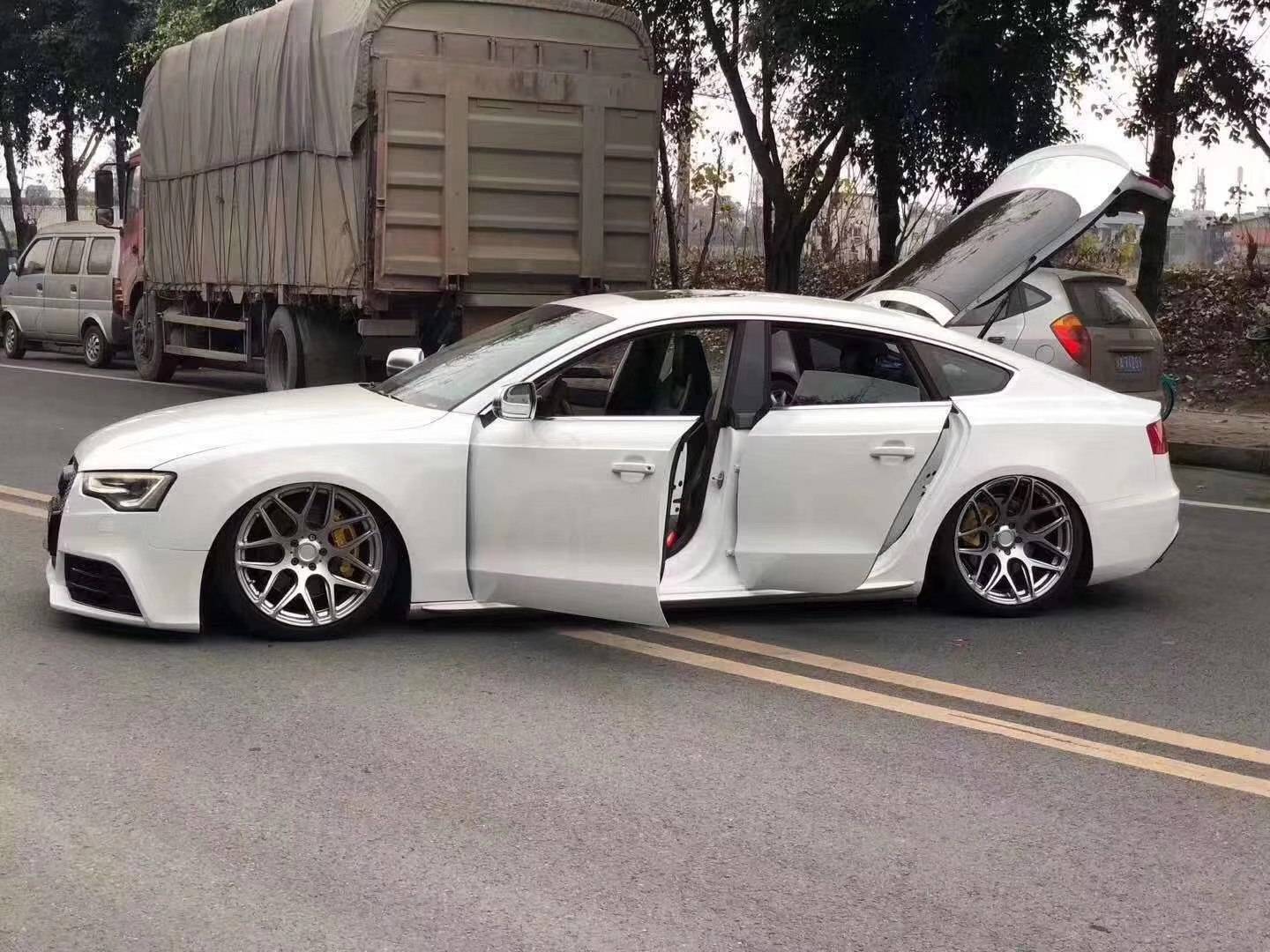 跟随白色奥迪 A5，踏上 AIRBFT 气动避震的潮流改装之旅_搜狐汽车_搜狐网