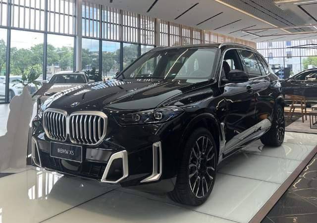 50万预算，宝马X5与问界M9，你会如何选择？_搜狐汽车_搜狐网